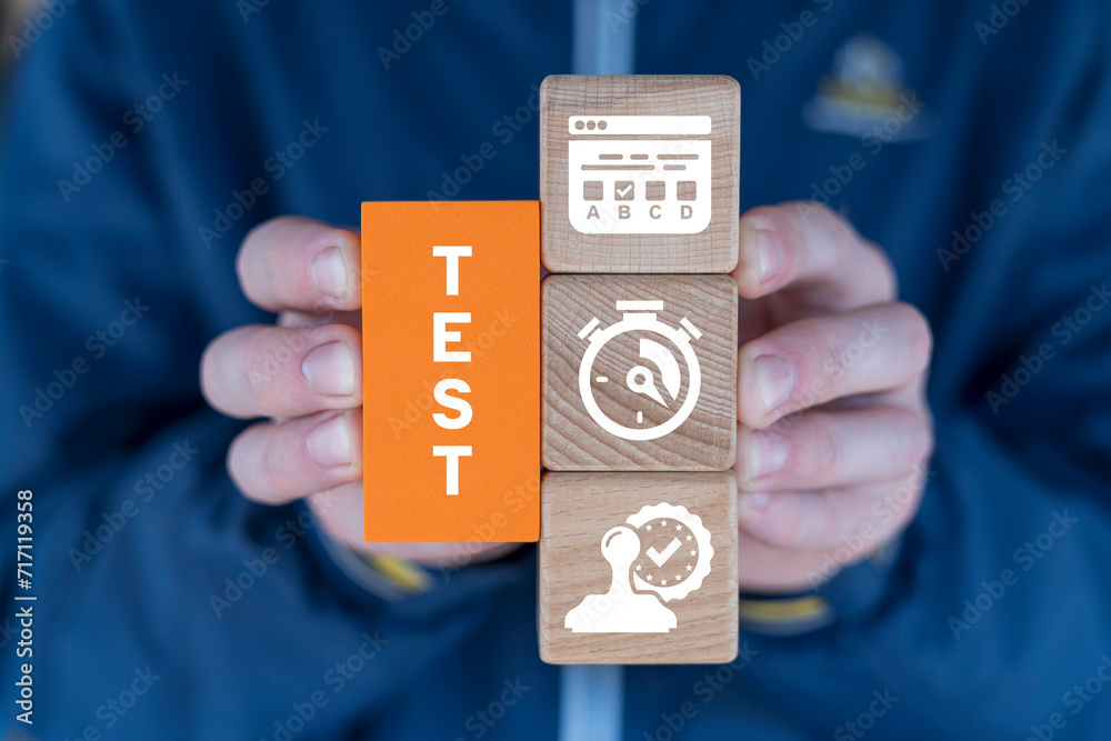 Man holding blocks sees word: TEST. Test Business Education Quality ...