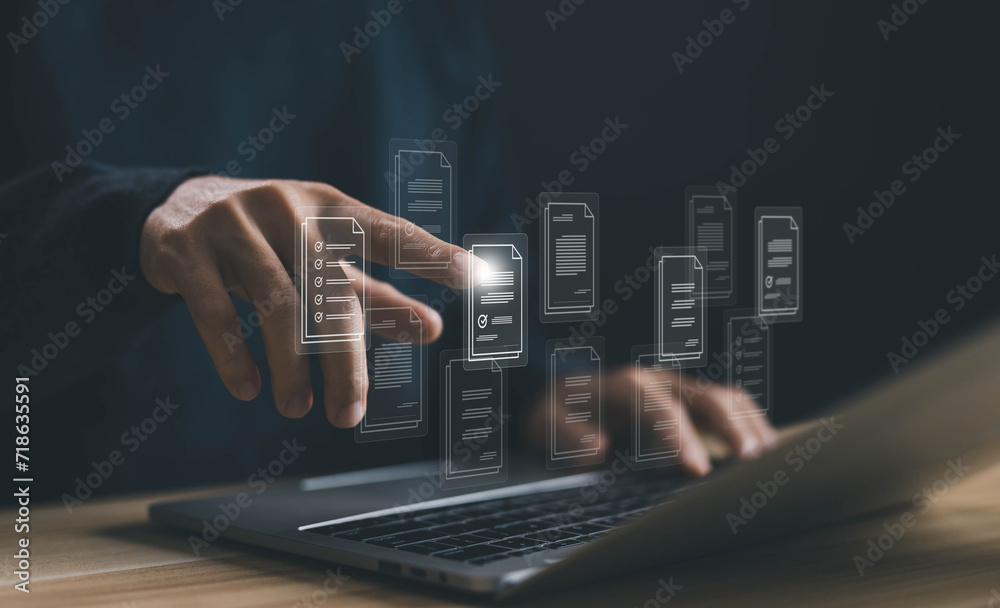 software for management recorded, businessman manages data on a laptop ...