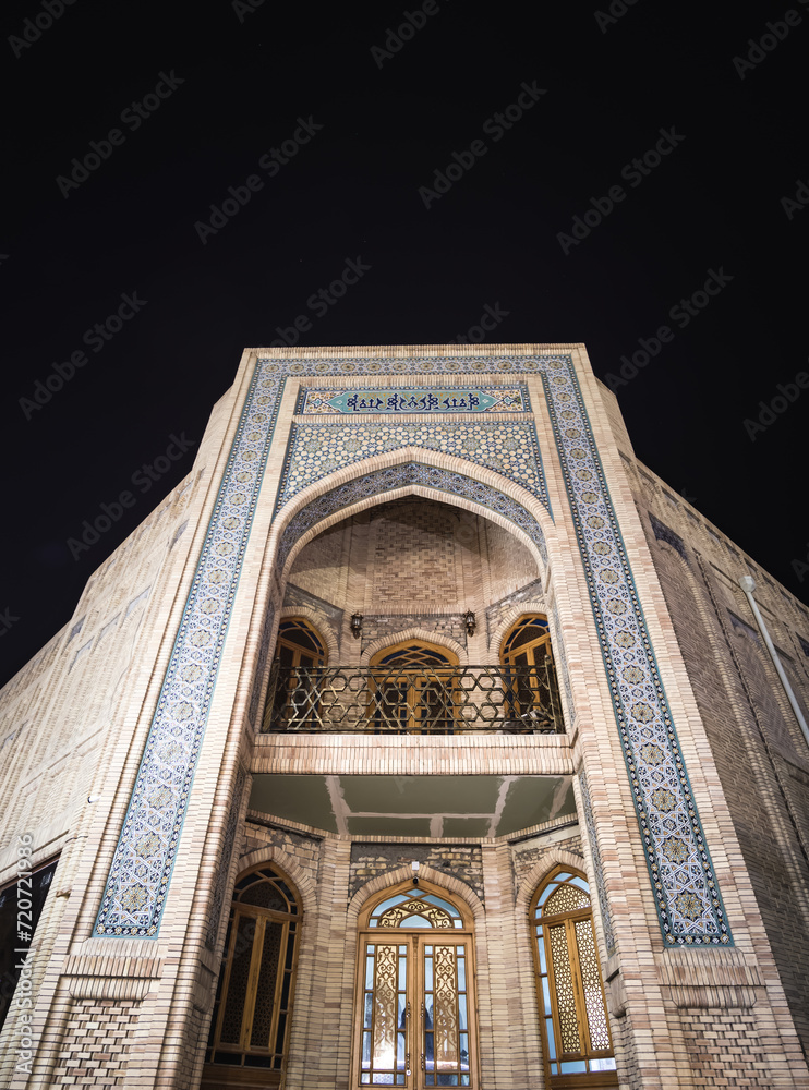 Night exterior of an ancient madrasah mosque in the ancient city of ...