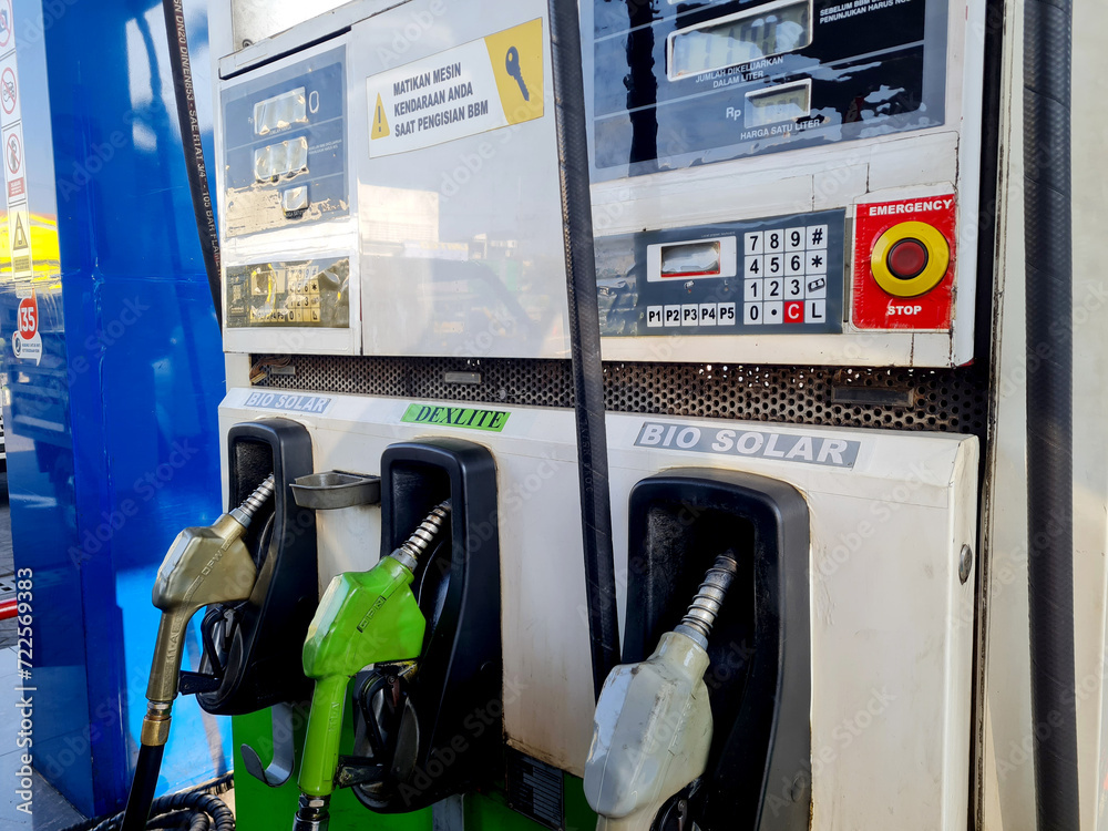 diesel type fuel pump. pump nozzle at a Pertamina gas station selling ...