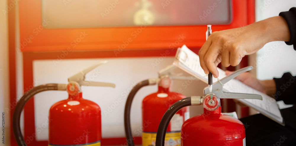 Engineer check fire suppression system,check fire extinguisher tank in ...