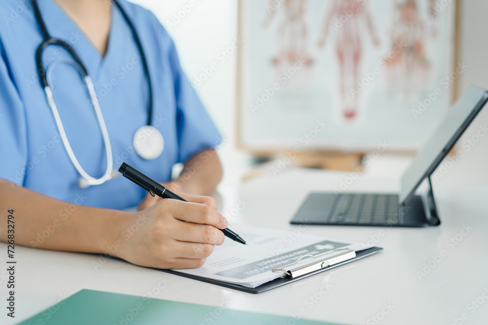Medical Professional Recording Patient Information During Health ...