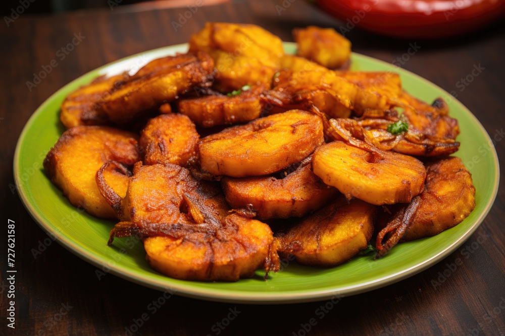 Ripe fried African plantain - local staple food served as meals with ...