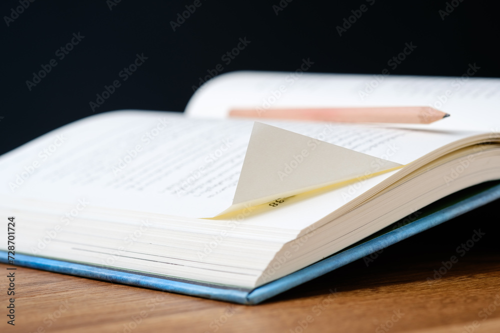 Folded corner paper of the book, fold down page of current reading ...
