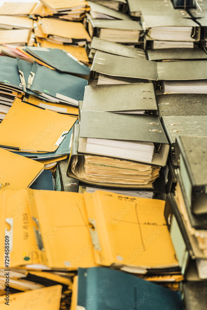 Still life of stacks of old documents and folders ready to be shredded ...