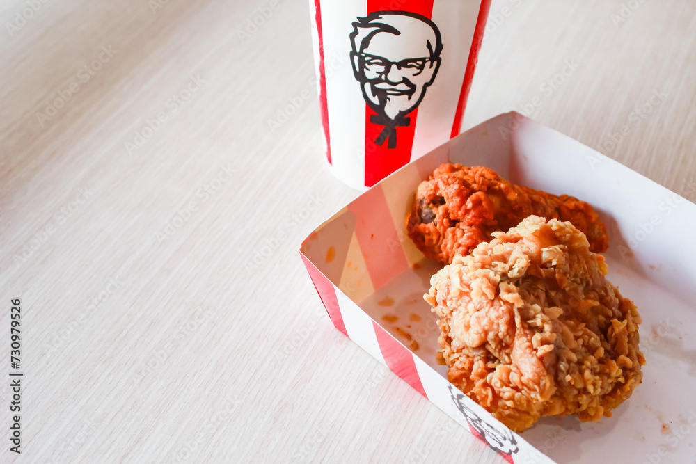 Bangkok, Thailand - January 07 2024 - Two pieces of KFC fried chicken ...