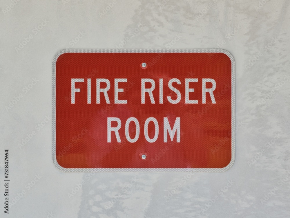 Fire Riser Room location sign isolated on an exterior door. Control ...