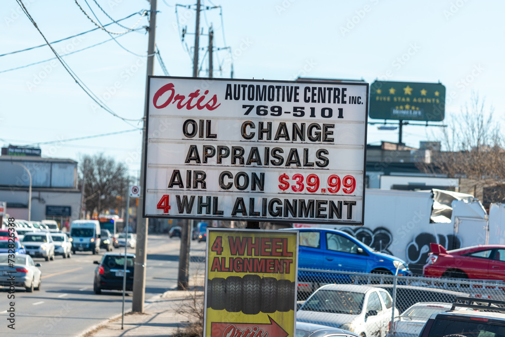 exterior marquee sign of Ortis Automotive Centre, an auto repair shop ...