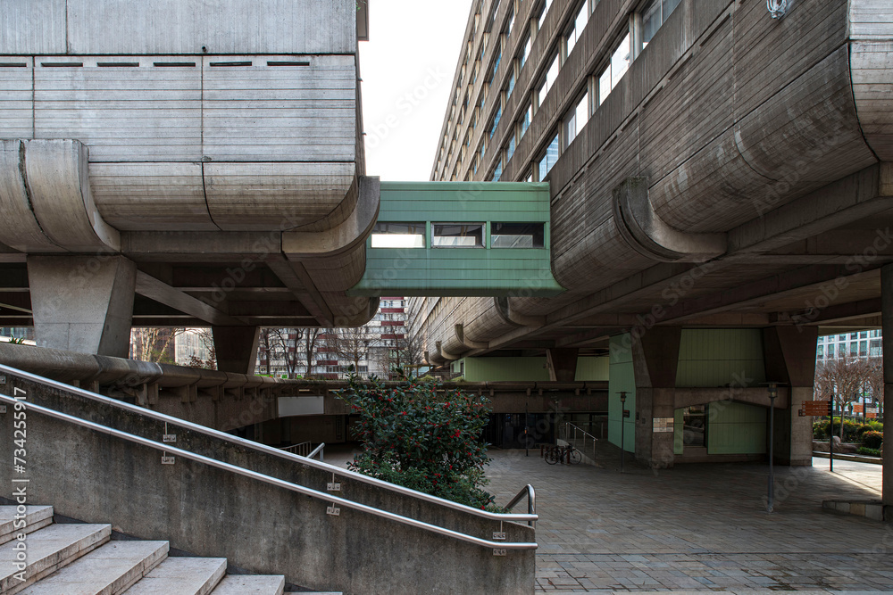 Exterior architecture of a building with a staircase and a passage ...