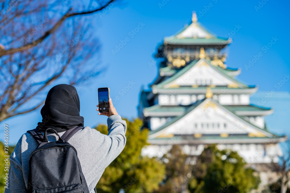 Travel, Muslim travel, Asian Muslim female tourist walking and visitor ...
