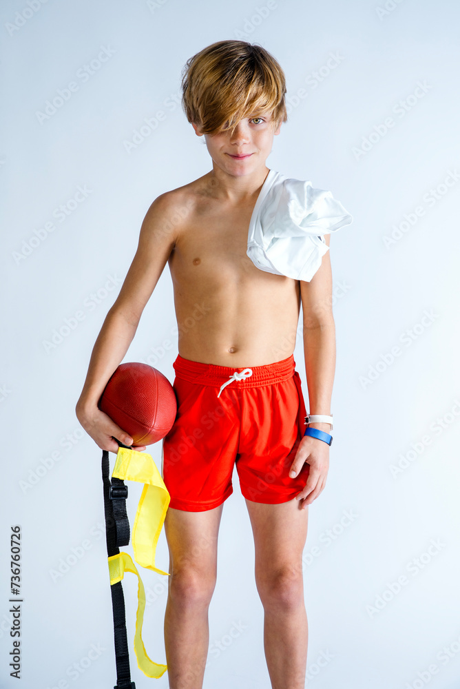Sweaty young flag football player smiling after winning the game Stock ...