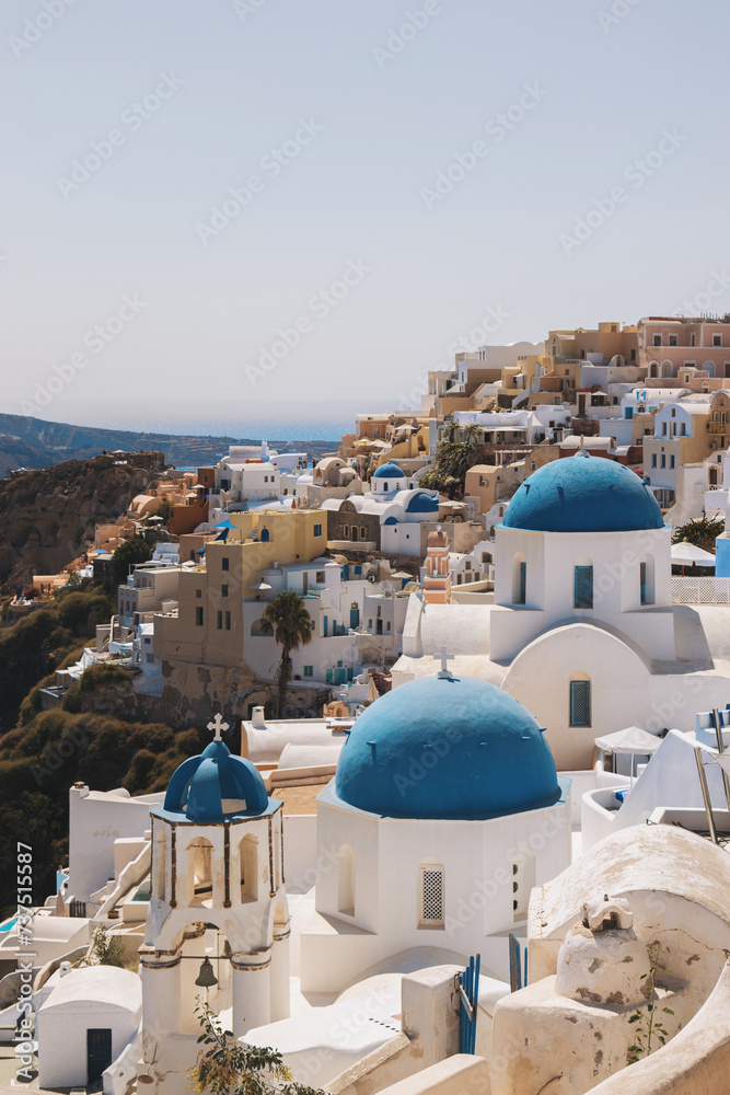 Beautiful Oia, Greece, with its iconic blue-domed churches overlooking ...