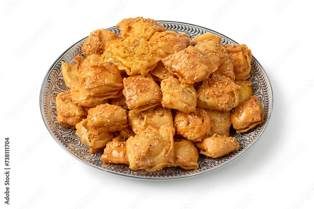 Plate with homemade Moroccan deep fried, square shaped, Rghayef honey ...