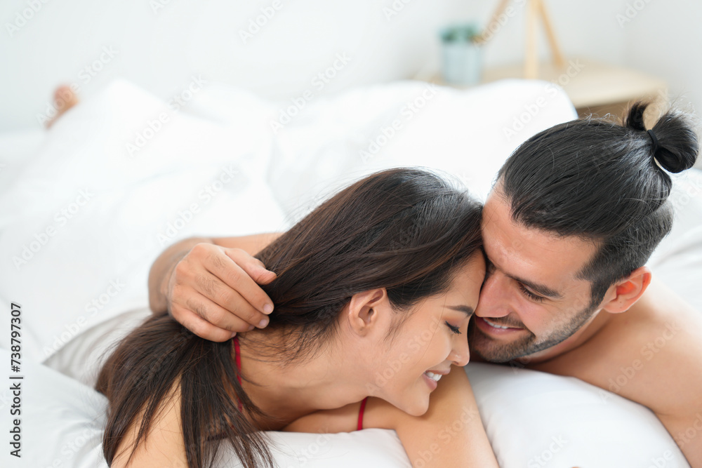 Intimate embrace between cherish moment together of romantic diversity couple Asian sexy ...