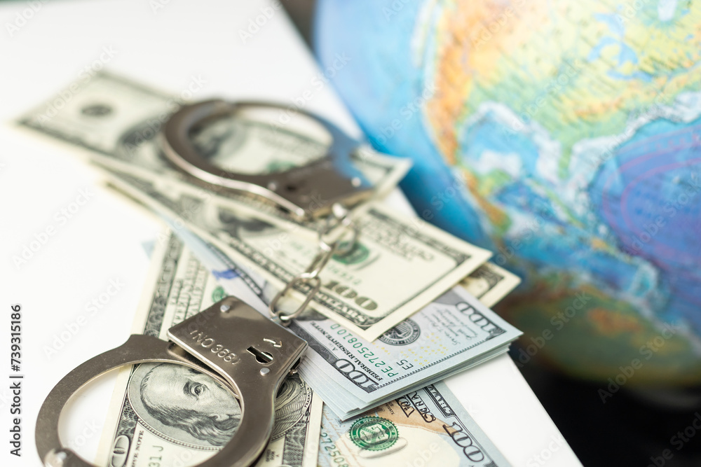 Map of world and Russia with pair of metal handcuffs. Arrest in Russian ...