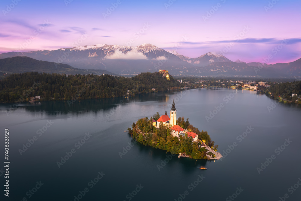 Elevated view with panoramic blue hour dusk night of Lake Bled Island ...