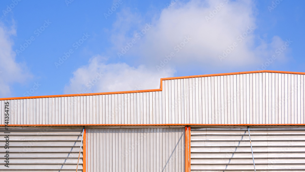 Aluminum ventilation louvers on corrugated steel wall of modern ...