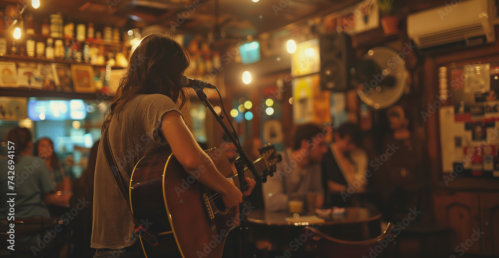 Musician serenades a captivated crowd with an acoustic guitar ...