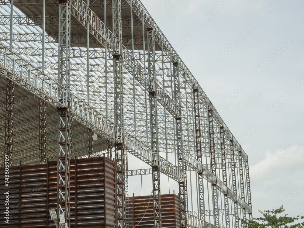 Factory is under construction, covering with welded structures of metal ...