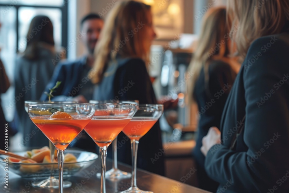 A diverse group of individuals standing around a bar, engaging in ...