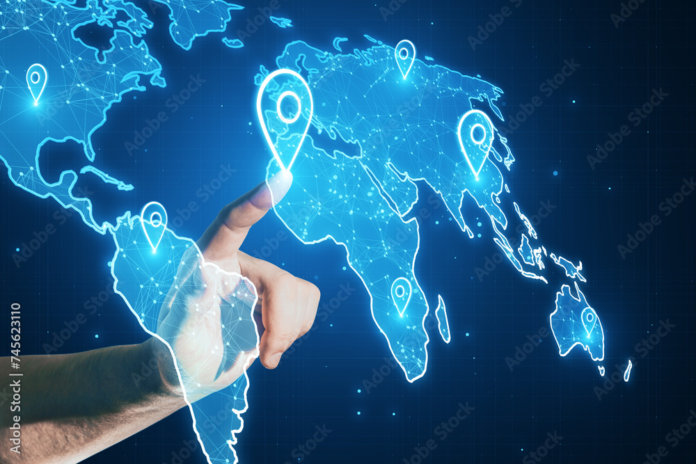 An image depicting a human hand interacting with a digital world map ...