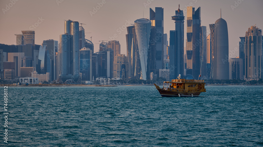 Doha skyline in Doha, Qatar from the Corniche street sunset shot with ...