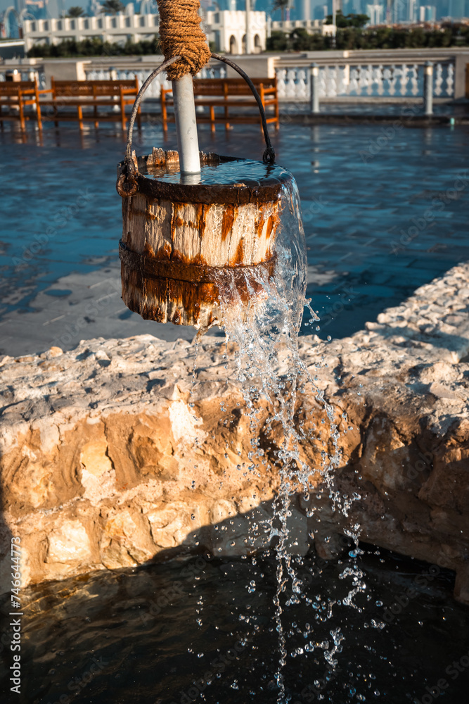 Closeup of flowing water at old well fountain, famous place in the ...