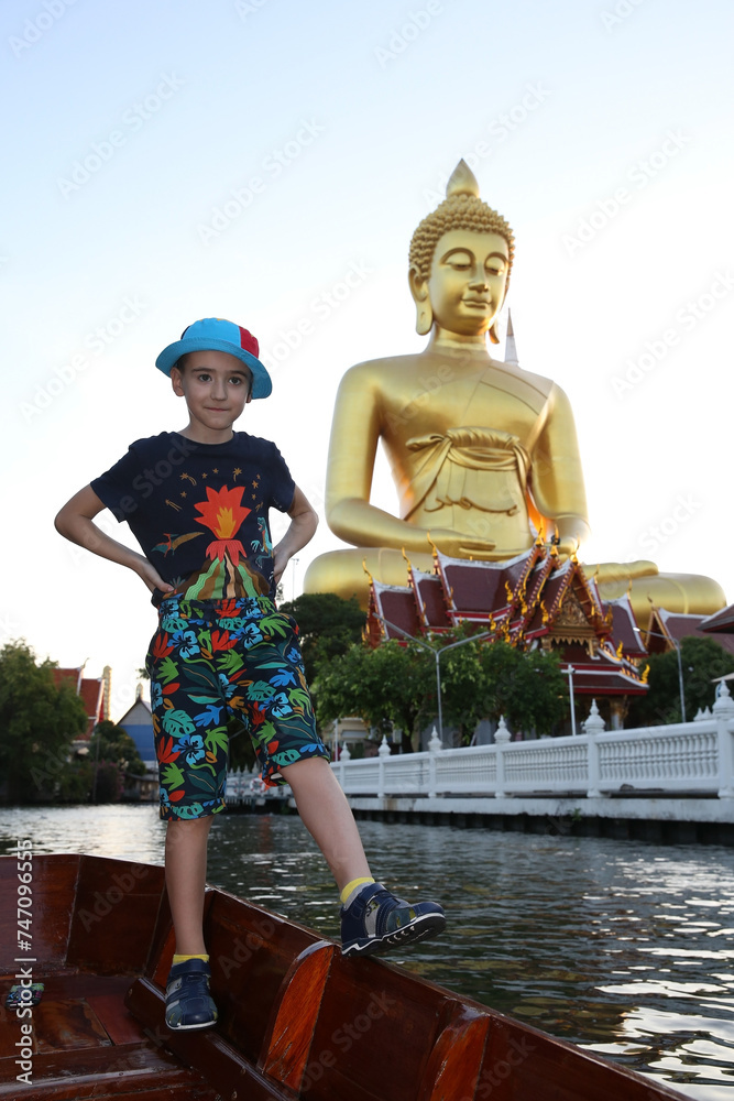 Tourist child, kid, boat. Paknam Phasi Charoen Temple at Chao Phraya ...