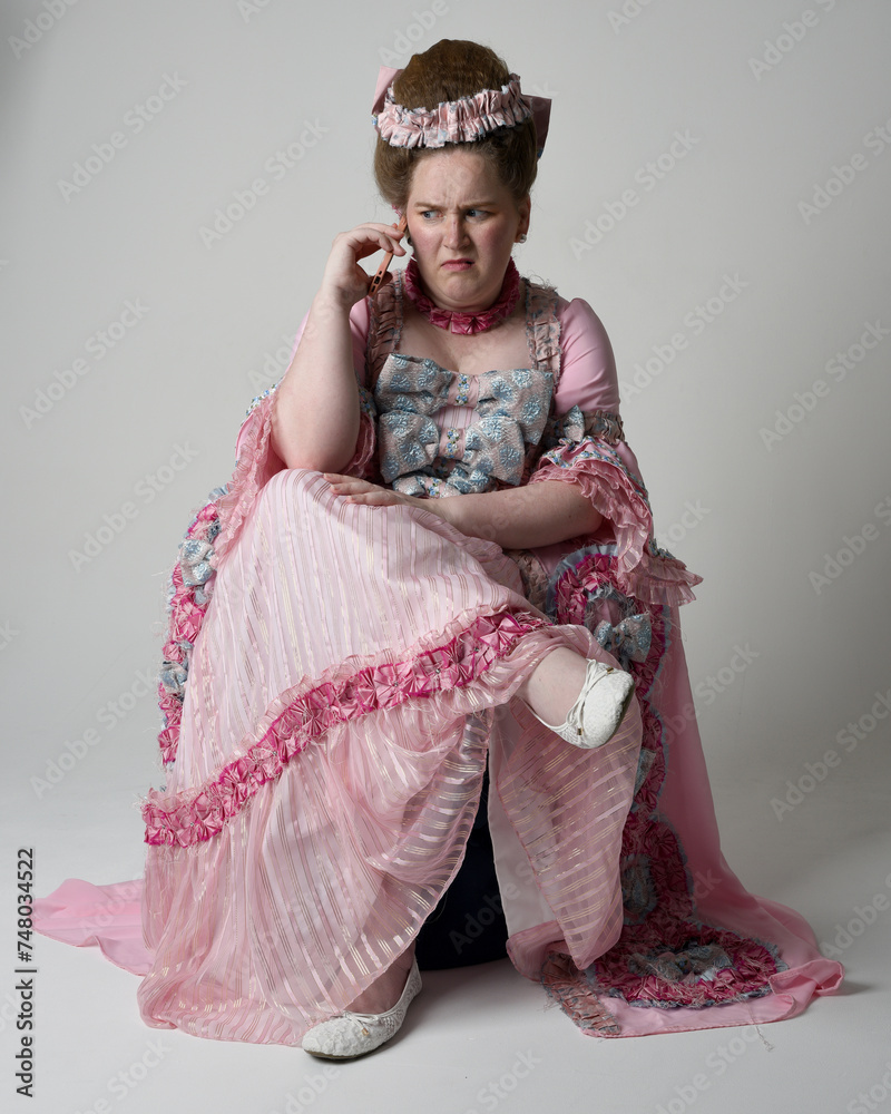Full length portrait female model wearing opulent pink gown costume of ...