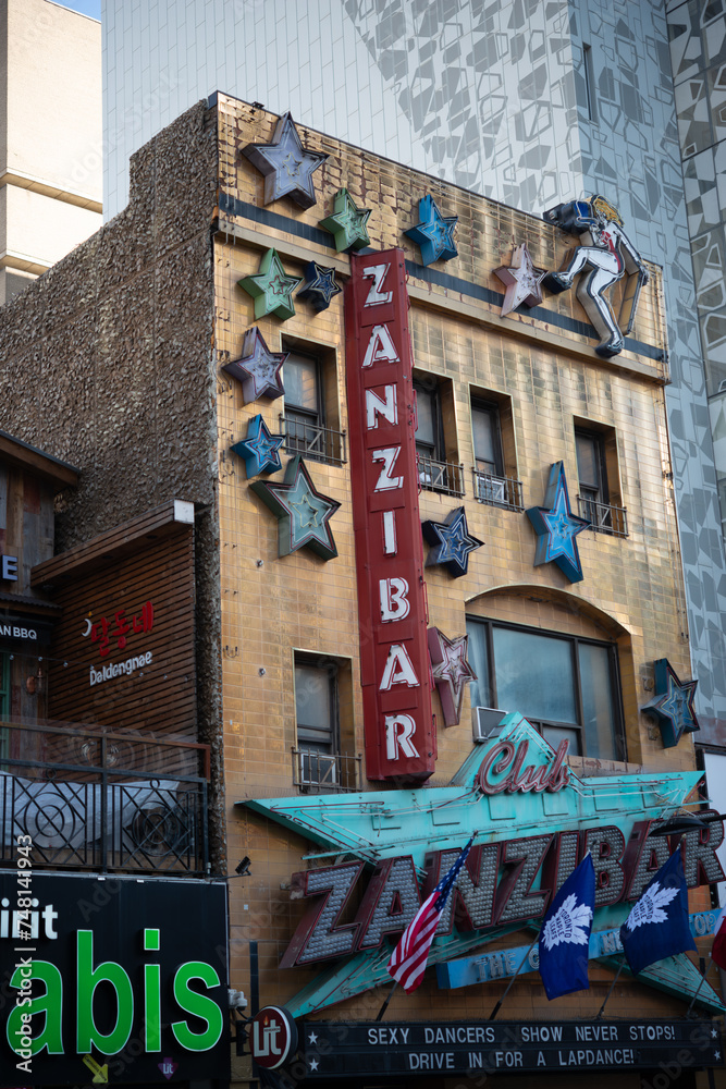 exterior facade and signs of Zanzibar Tavern (or Club Zanzibar) an ...