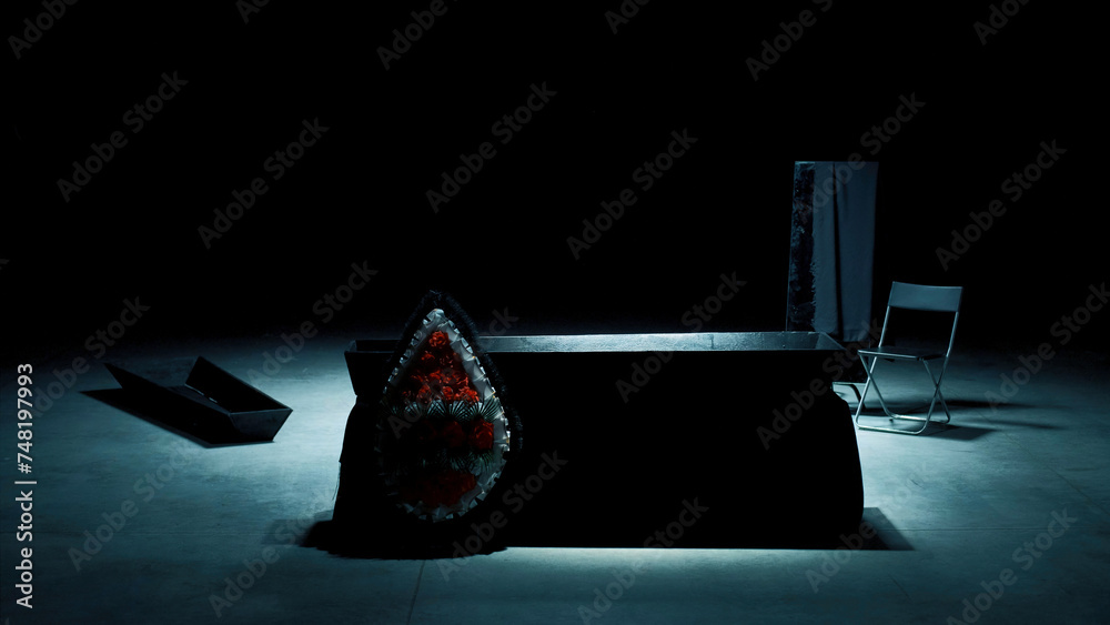 Coffin on stage. Stock footage. Dark scene with empty coffin and ...