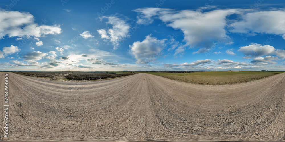 Stock-Foto „hdri 360 panorama on gravel road among fields in spring ...