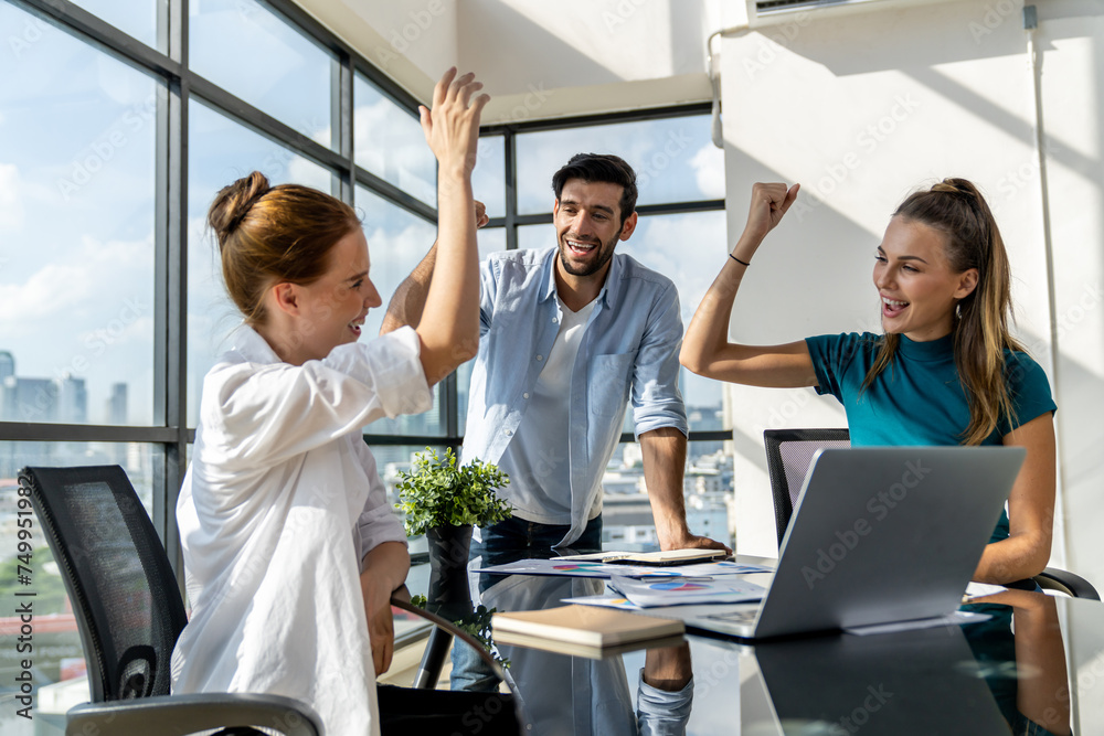 Group of happy businesspeople celebrate their successful project ...