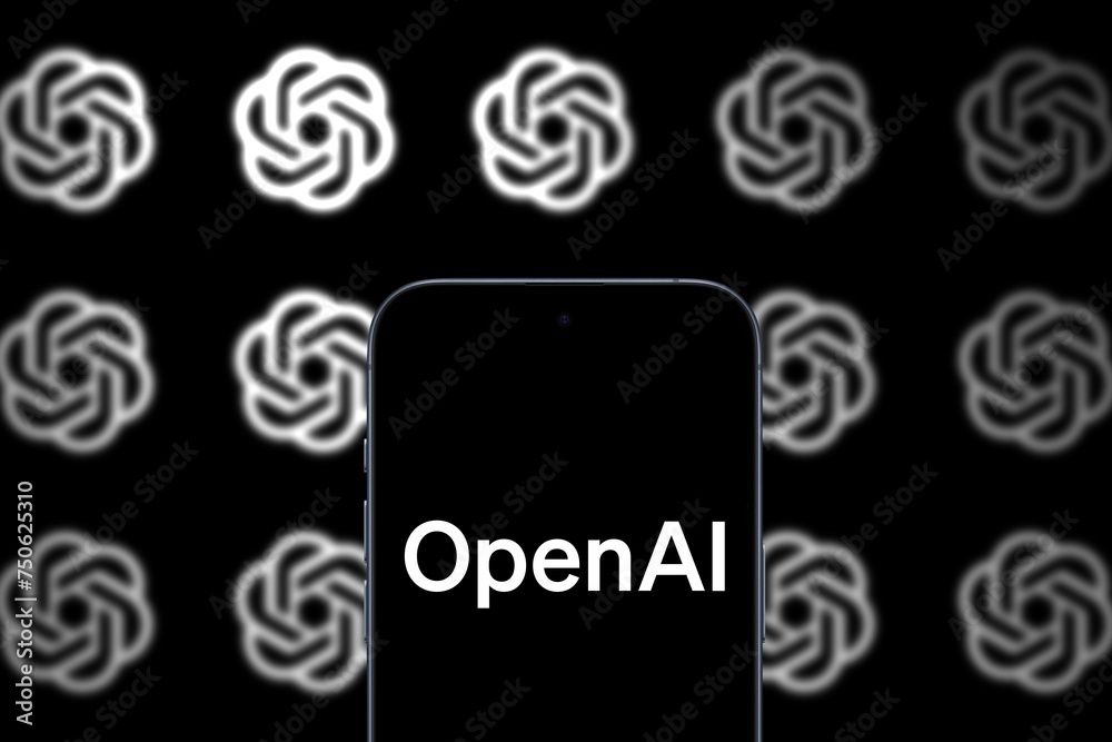 OpenAI lettering is displayed on a modern smartphone, black background ...