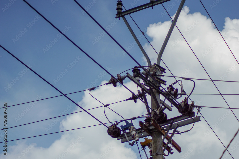 high voltage electric power lines on the sky background. electric pylon ...
