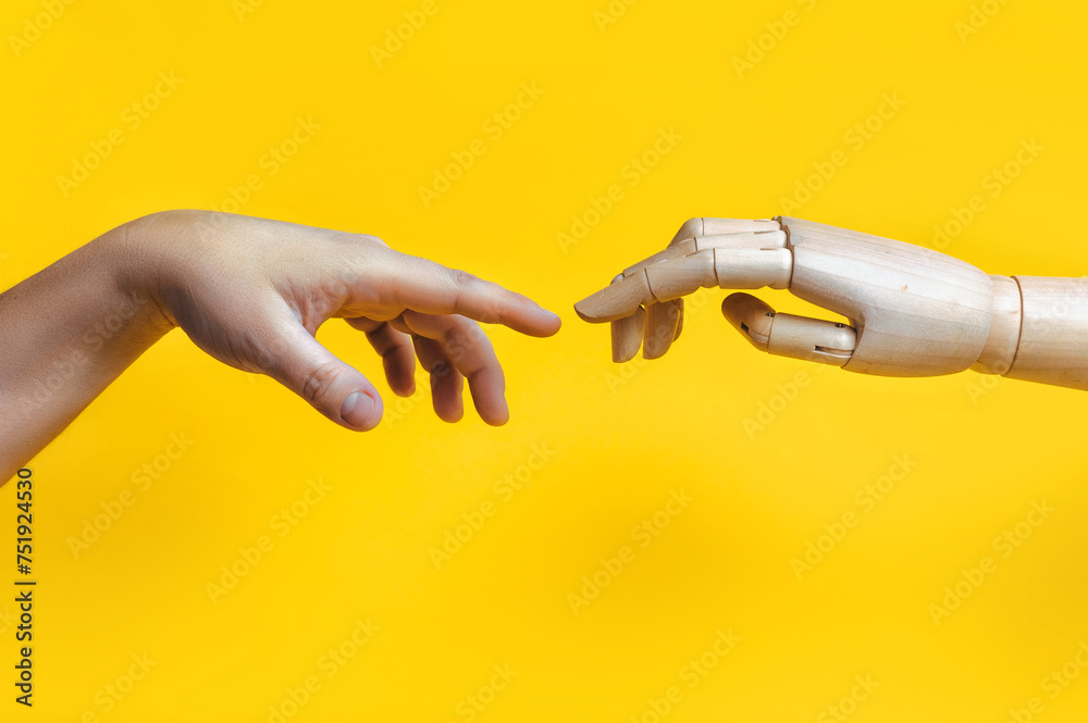 The hand of a robot,a golem,a mechanical man reaches out to the fingers ...