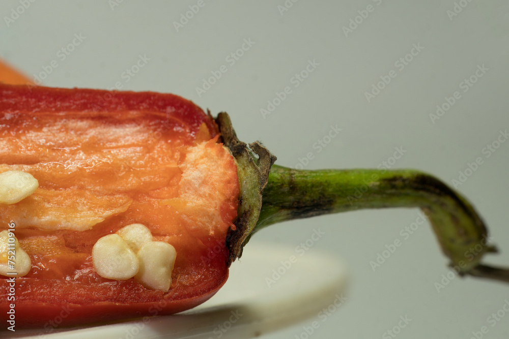 Vibrant Slice of Red Chilli: A Glimpse into Spicy Freshness, Experience ...