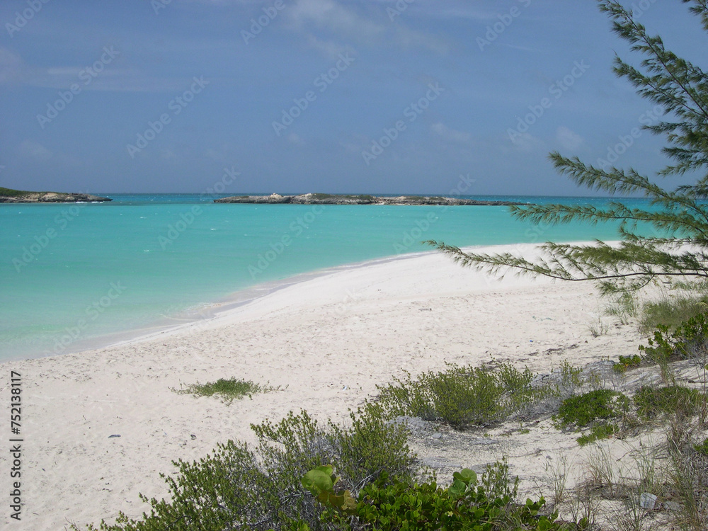 Turquoise sea water and blue sky in Tropic of Cancer Beach, Little ...