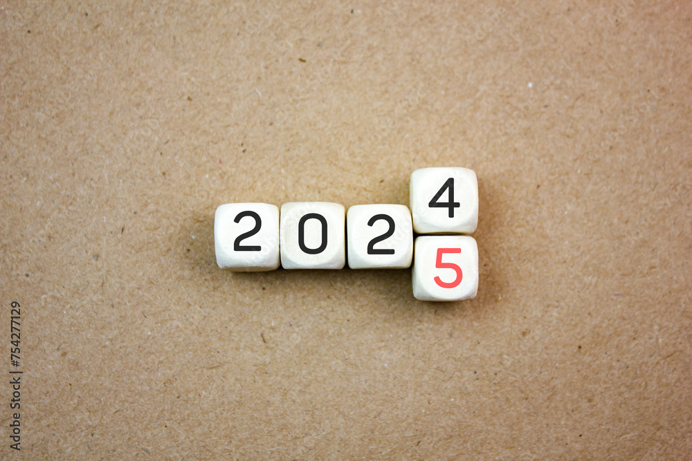 2024,2025 shift on wooden cubes. Annual concept 2024,2025. Plan, goal ...
