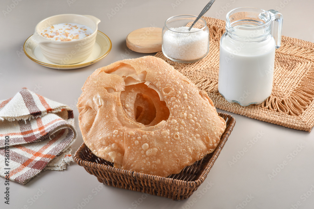 Khajla is a flaky cereal food made with wheat flour and lot of ghee ...