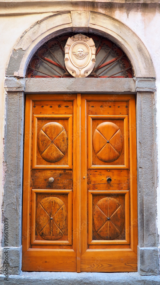 Ancient and magnificent solid wooden door to the town of Bonifacio, a ...