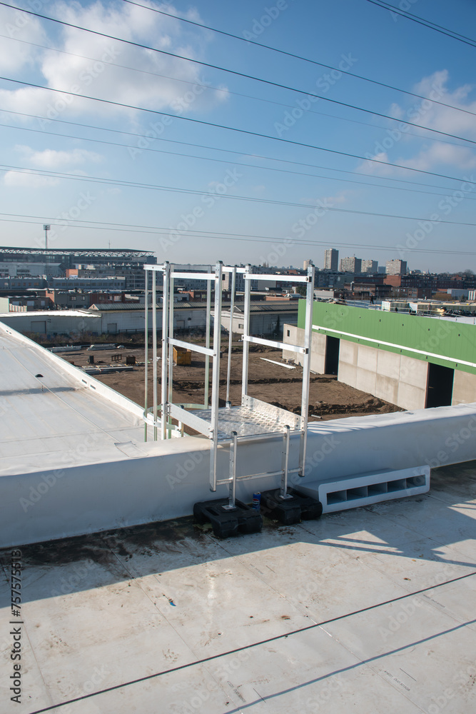 protects against slipping of an employee standing on the parapet or ...