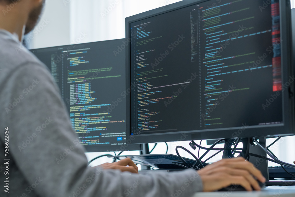 Asian Prompt Engineer Developer Coding App With Software Data Sitting In Front Of Computer