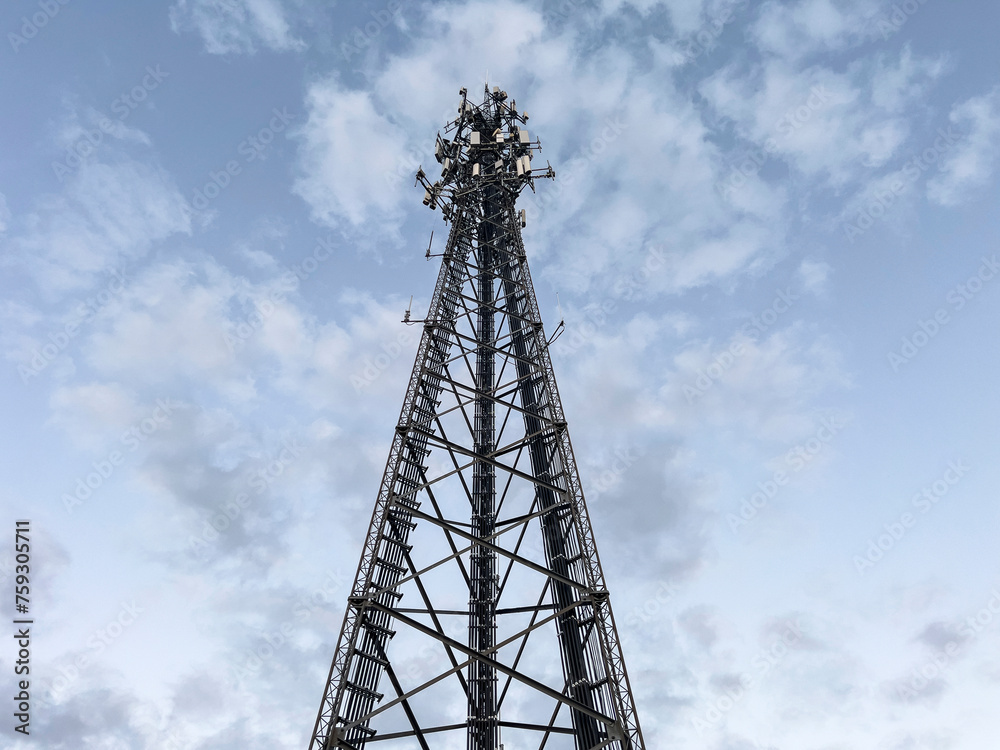 Tall Cell Phone tower landscape in sky with clouds Stock Photo | Adobe ...