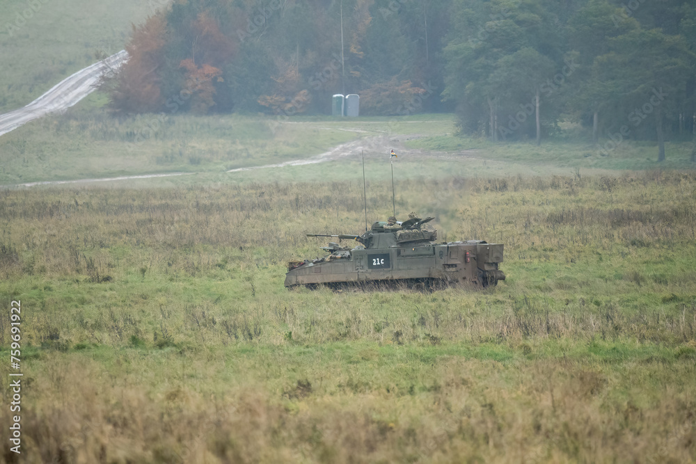 British army Warrior FV510 Infantry Fighting Vehicle in action on a ...