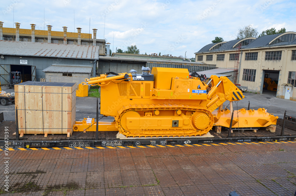 Huge crawler dozers transported by rail. Crawler dozers secured for ...