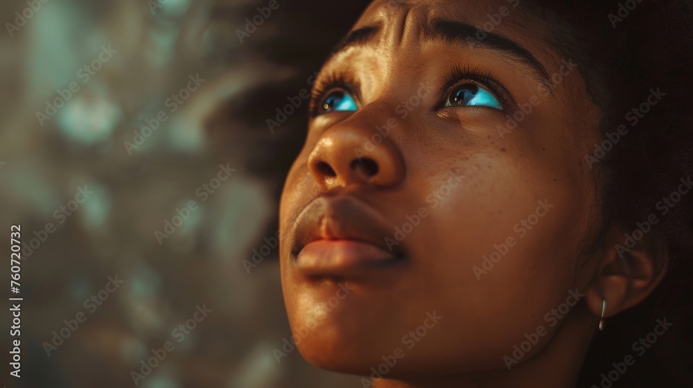 Touched by His Grace. Beautiful young black woman looking up with tears ...