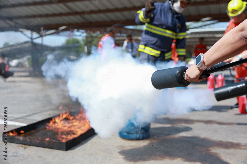 Foto Employees firefighting training, Concept Employees hand using fire ...