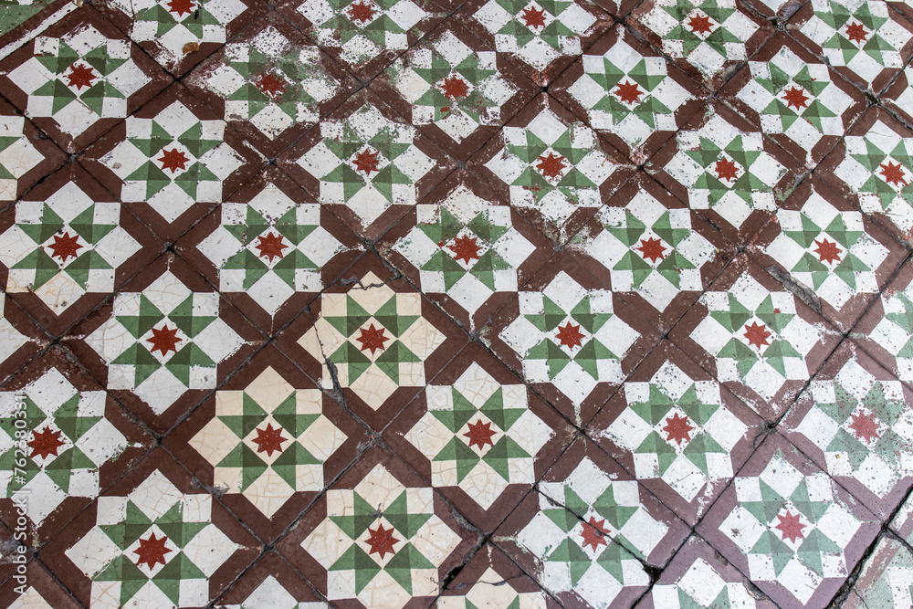 Pavement with old decorated ceramic tiles in the historical center of ...