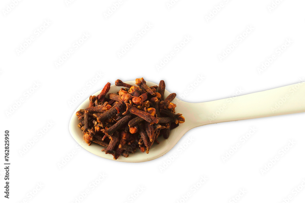 dried spice clove aromatic flower buds in spoon,cutout transparent ...